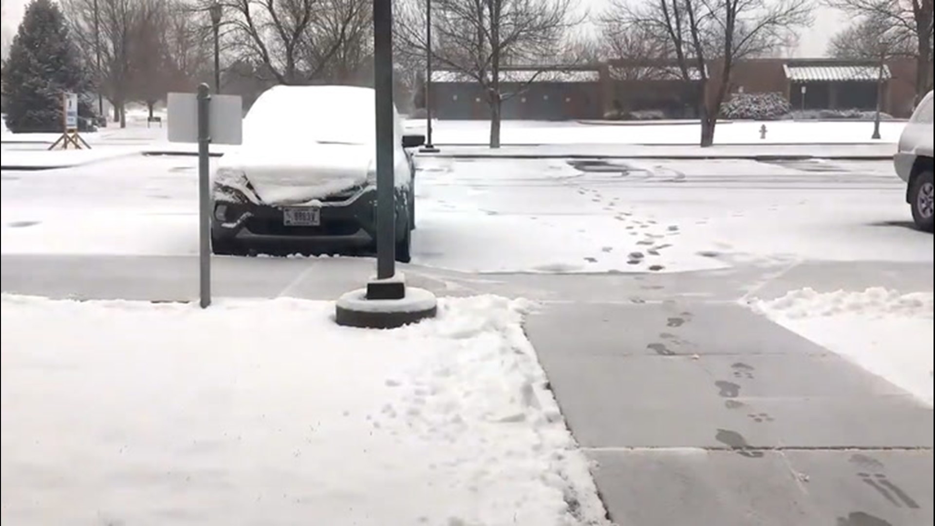 Time-lapse video of snow accumulating over this parking lot | wbir.com