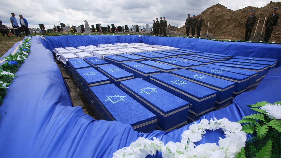 Remains of 1,200 Holocaust victims laid to rest in Belarus after mass ...