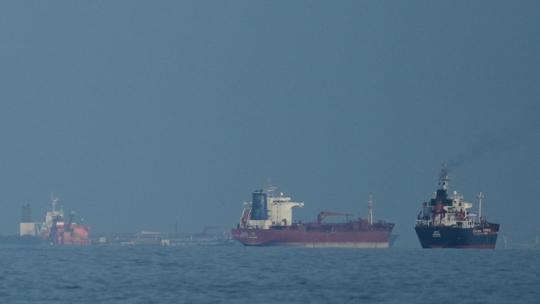 Container vessel attacked near Strait of Hormuz, British military says ...