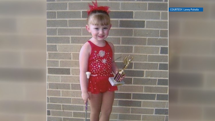 Gold medal baton twirler now performs with the UT band | wbir.com