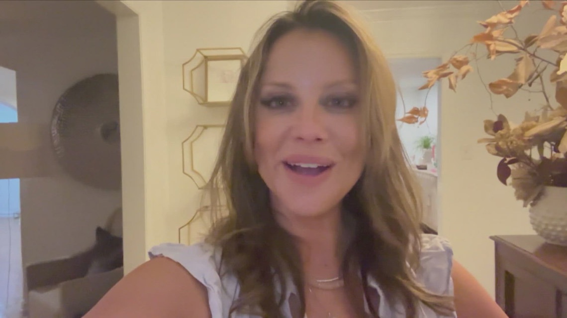 Abby Ham checks in before her flight to the College World Series finals ...