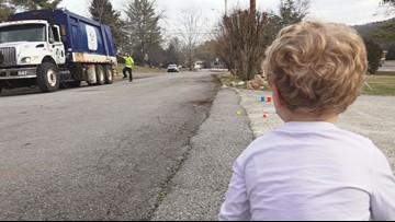Little boy surprised by his heroes, the garbage men | wbir.com