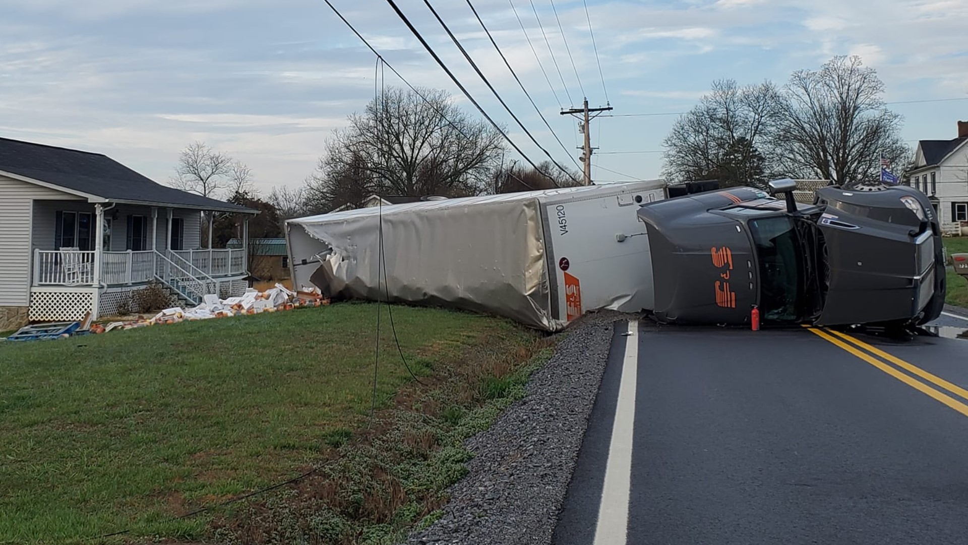 Spilling the beans: Truck full of baked beans flips on Newport Highway ...