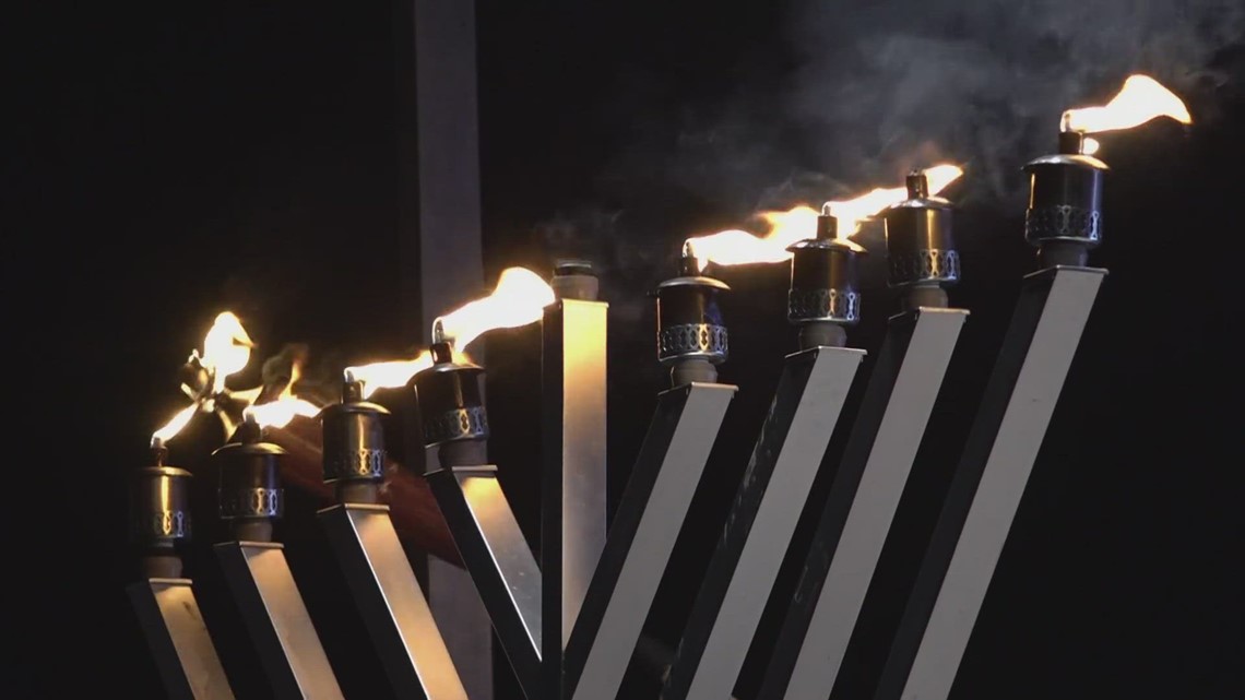 'Candles of celebration are intertwined with flames of memorial ...