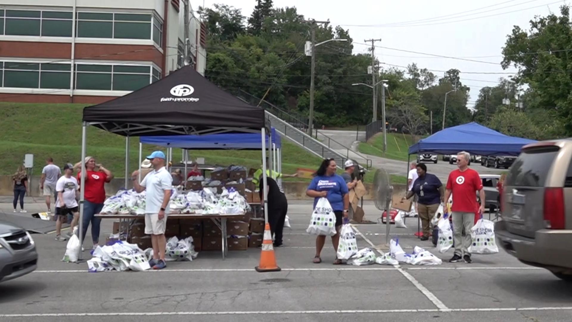 All available backpacks given away during 'School Mania' event, other ...