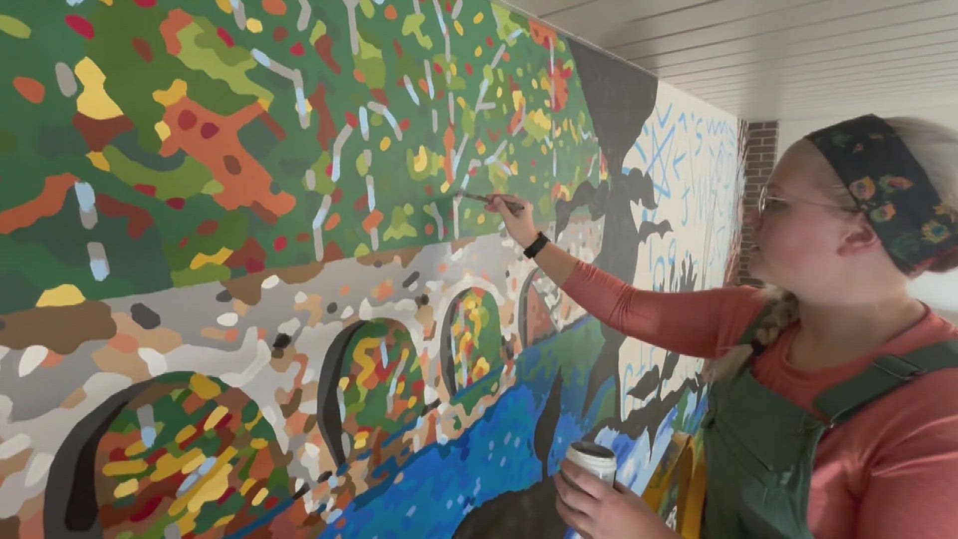 UTK student whose art graced 'The Rock' finishes her third mural at ...