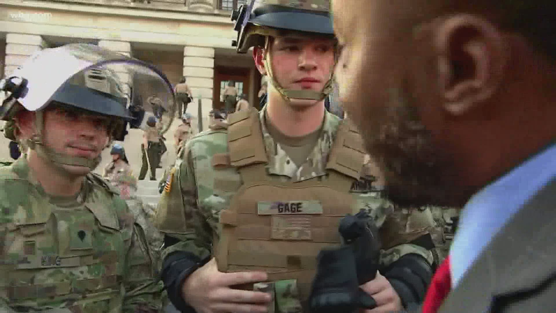 Tennessee National Guardsmen put down their shields during peaceful ...