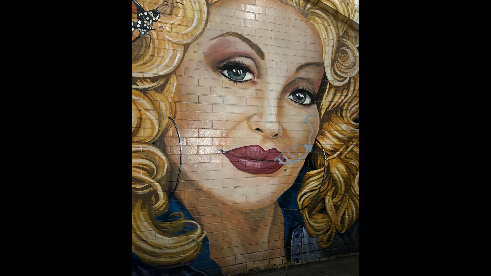 Vandals target Dolly Parton mural in Knoxville again | wbir.com