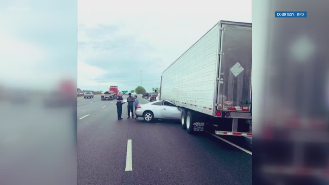 Lanes reopen after car stuck under semi-truck | wbir.com