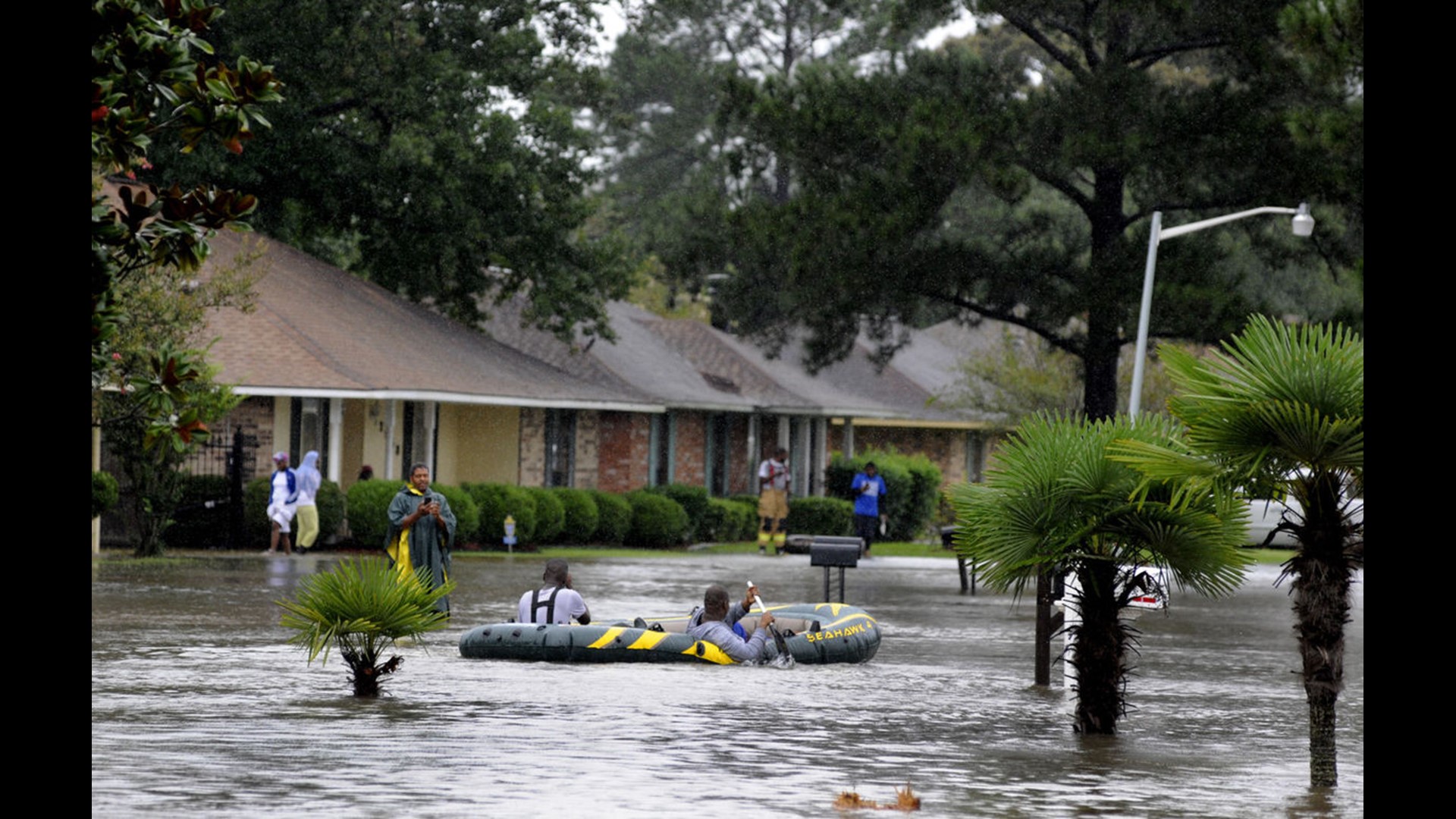 At least 4 dead, thousands of people rescued in southern La. flooding ...