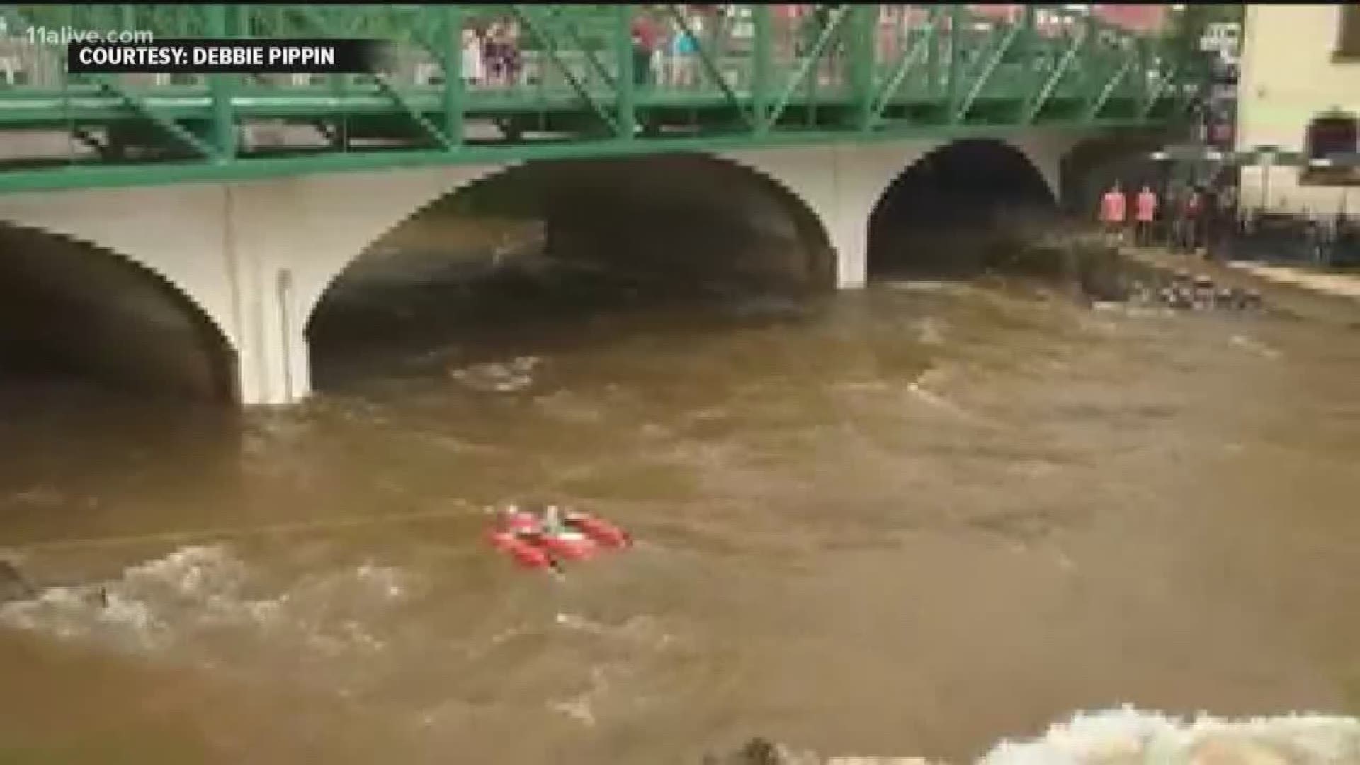 Flooding In Helen Takes Over City Streets As Warnings Continue
